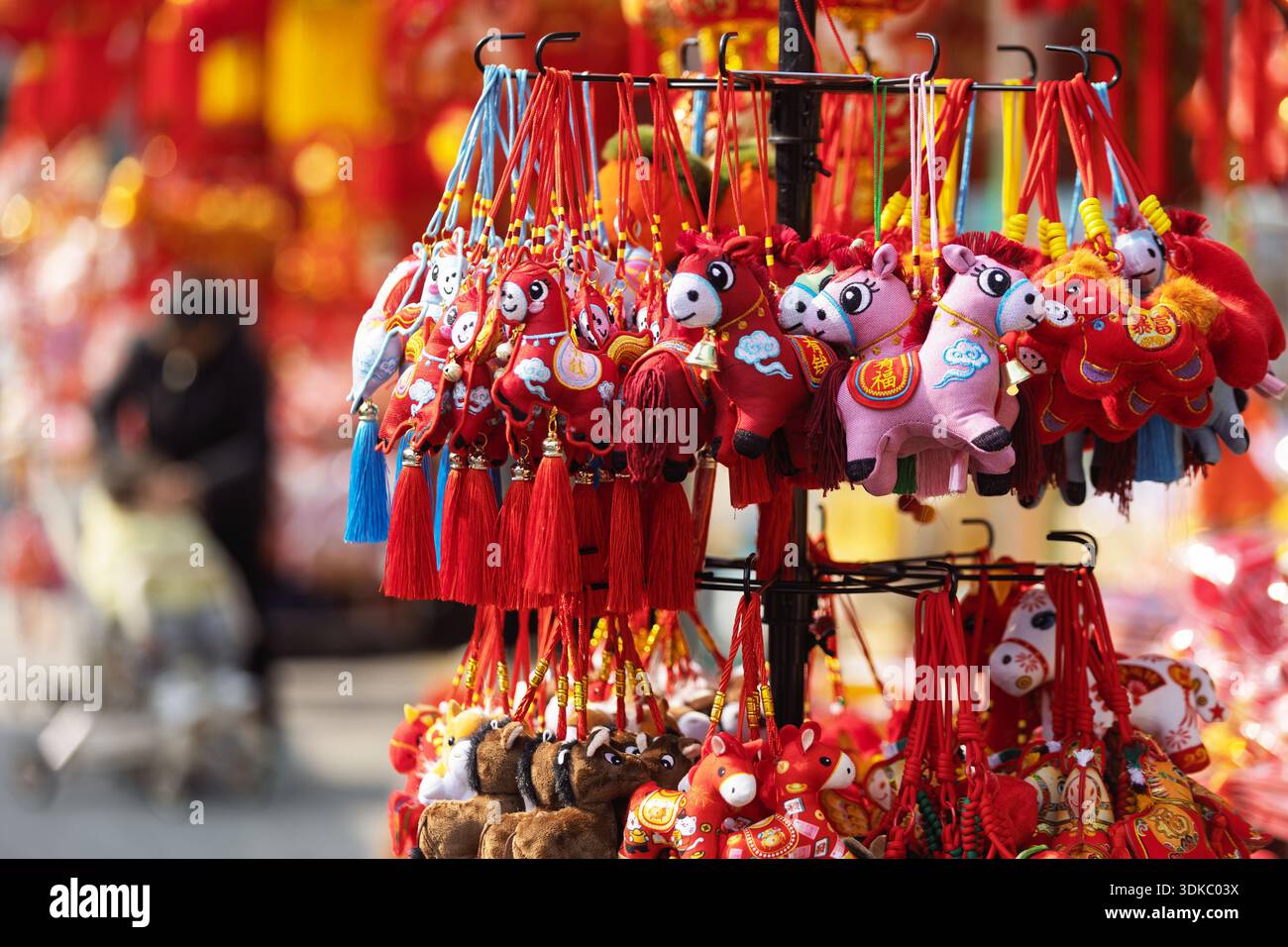Citizens select New Year decorations at a supermarket in Nanjing City ...