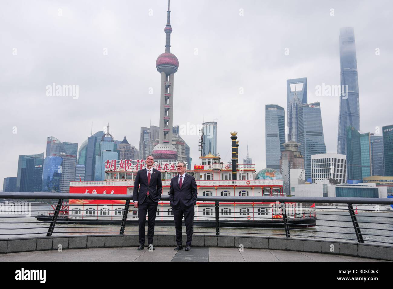 Prime Minister Sir Keir Starmer (right) walks the Shanghai Bund with ...