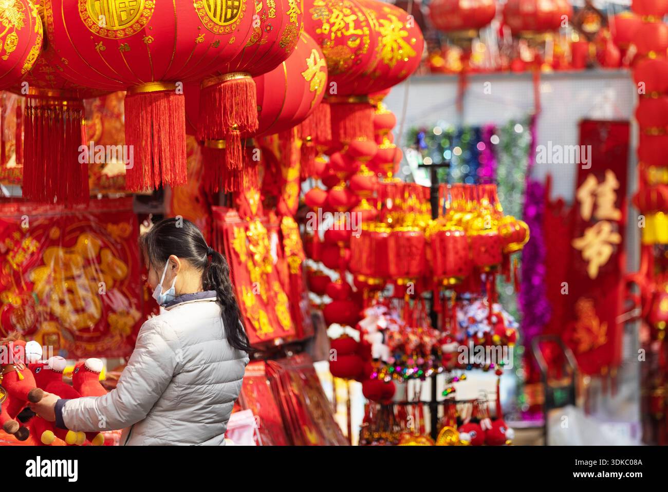 Citizens select New Year decorations at a supermarket in Nanjing City ...