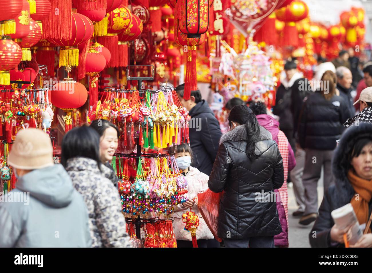 Citizens select New Year decorations at a supermarket in Nanjing City ...
