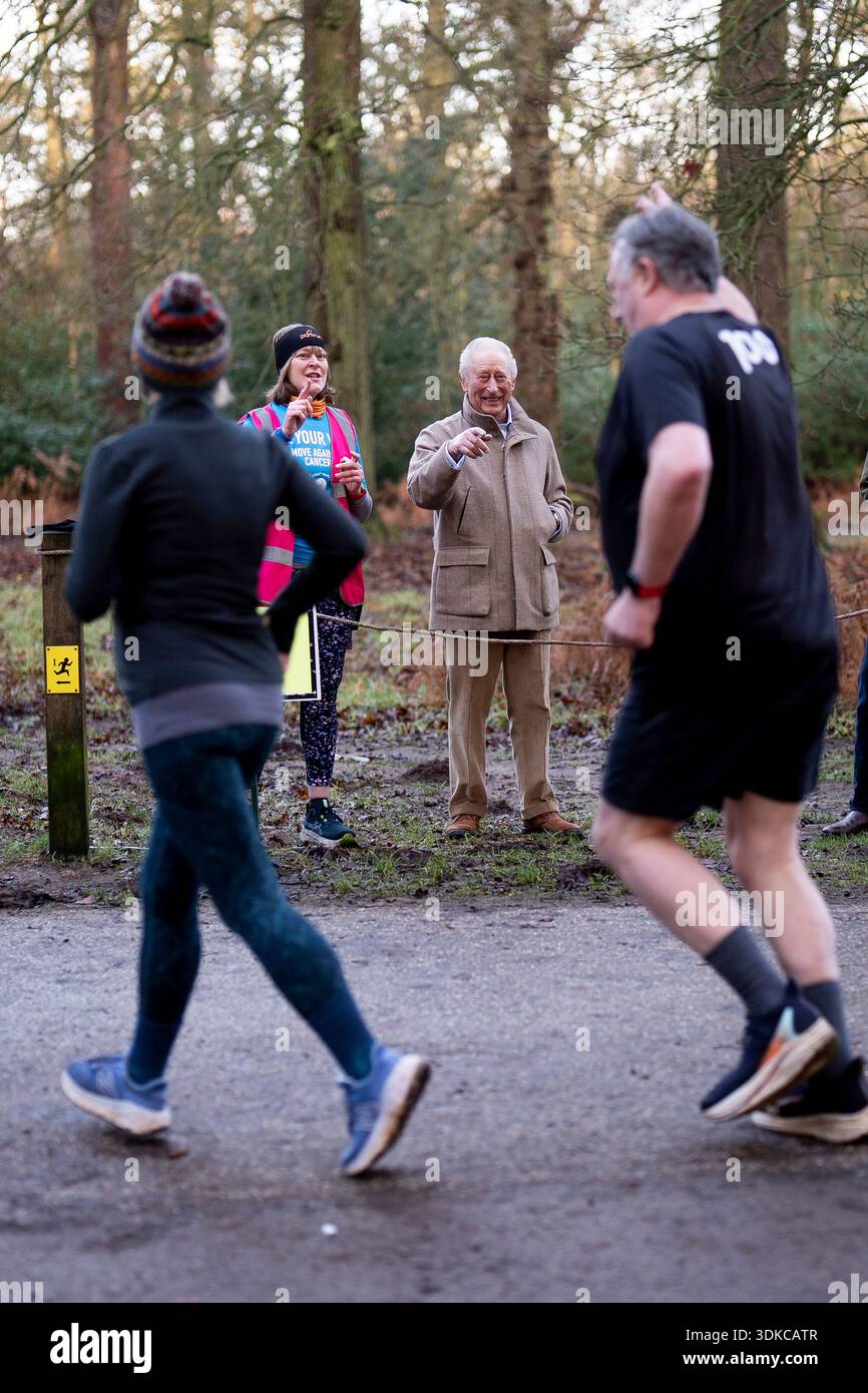 King Charles III and Sarah Byatt at a marshal point watches runners in ...