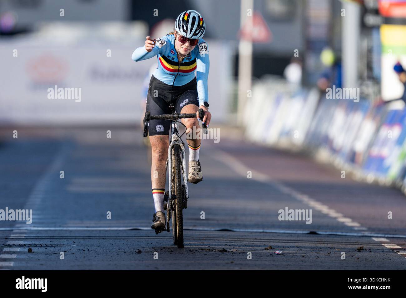 Belgian Liese Geuens crosses the finish line at the junior women race ...