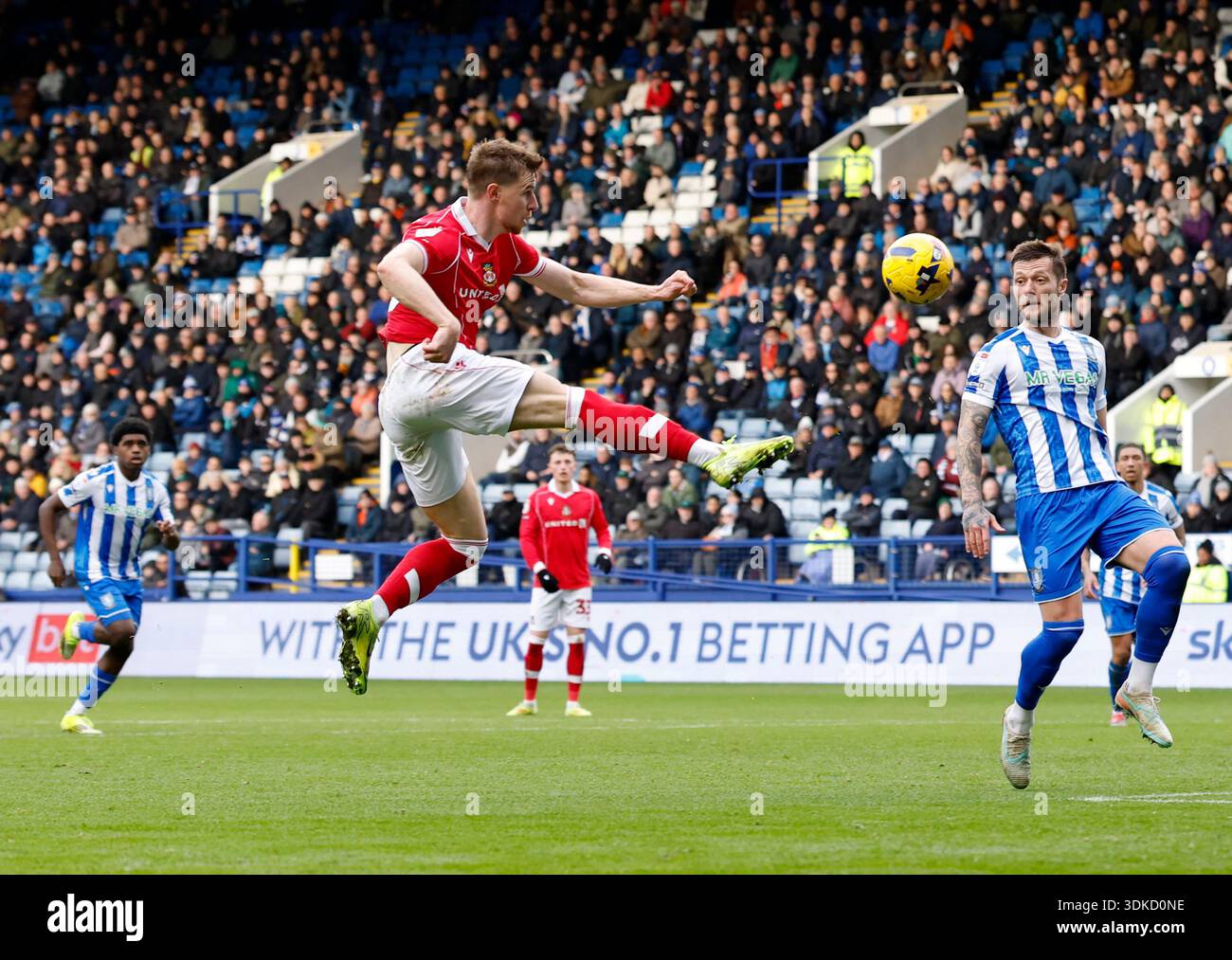 Wrexham's Ben Sheaf has a shot at goal during the Sky Bet Championship ...