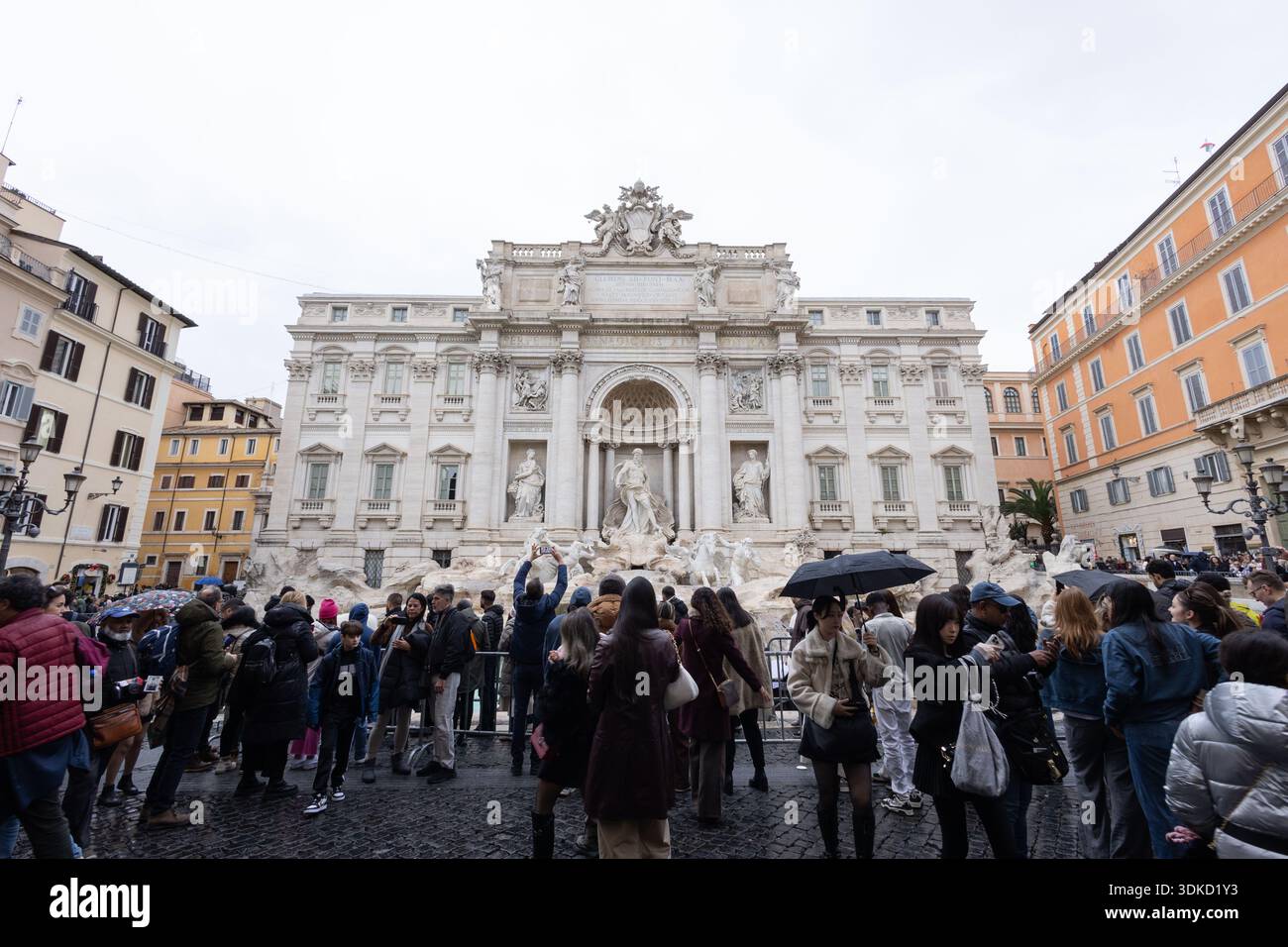 Rome, Italy. 31st Jan, 2026. Tourists line up to enter the Trevi ...