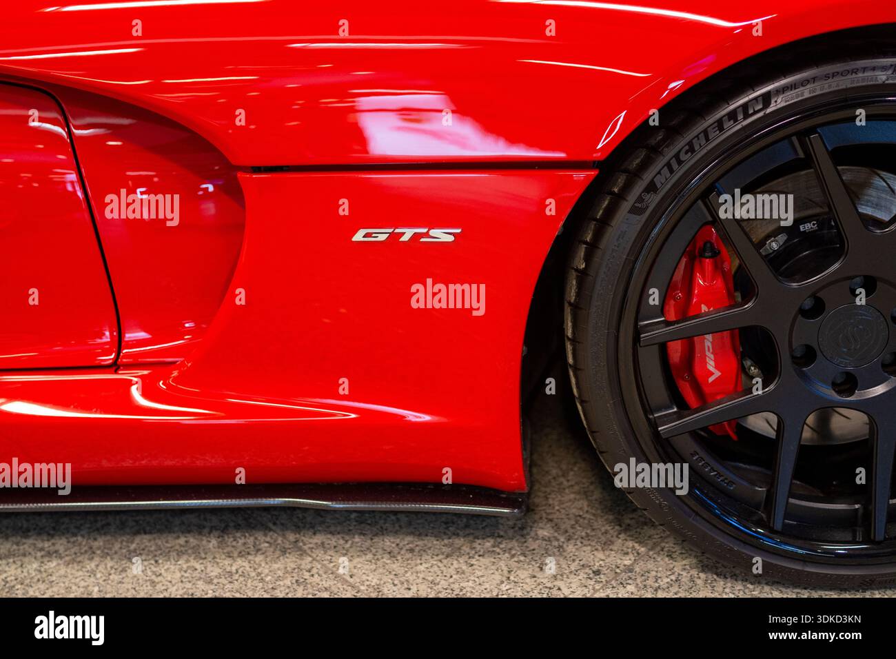 Red GTS Coupe Side View Showcasing Matte Black Wheel And Red Brake ...