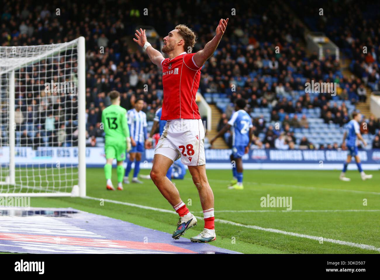 Sam Smith of Wrexham celebrates scoring the opening goal during the Sky ...