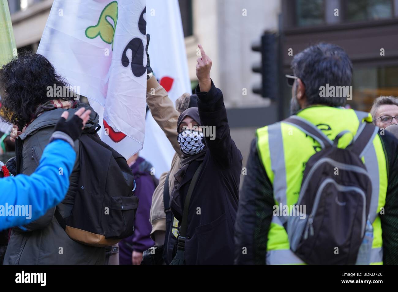 EDS NOTE GESTURE People take part in a Palestine Coalition march in ...