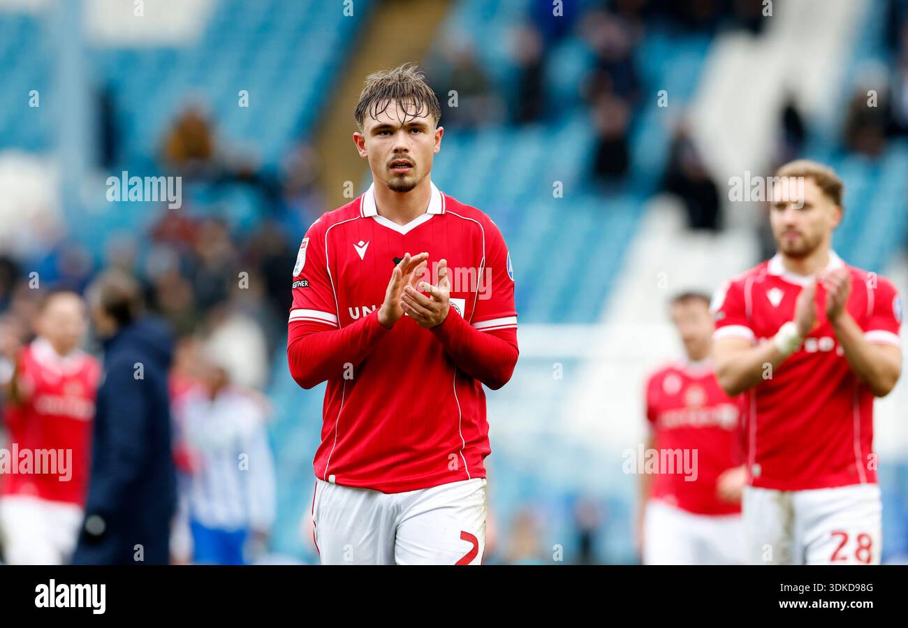 Wrexham's Callum Doyle applauds the fans after the Sky Bet Championship ...