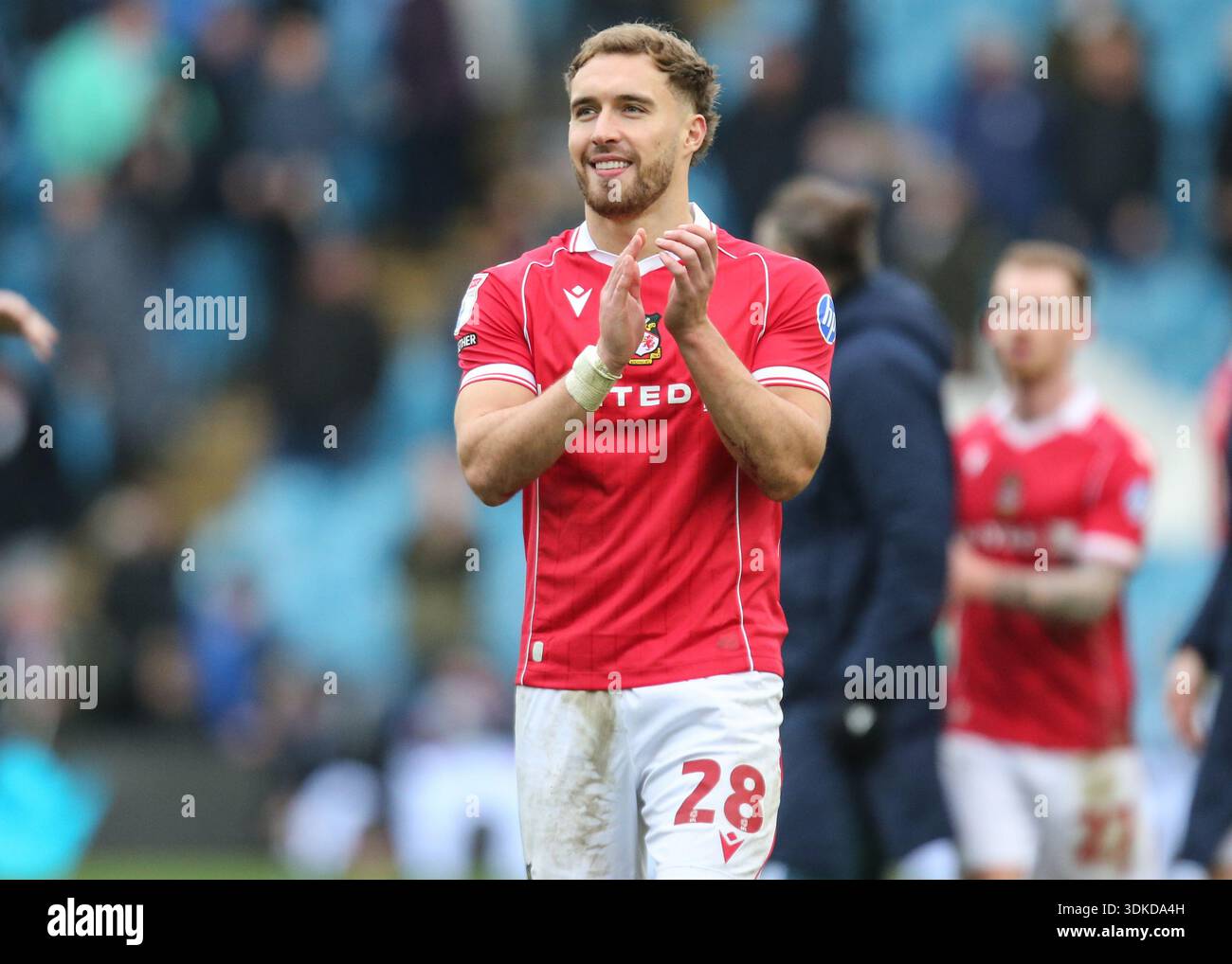 Sam Smith of Wrexham applauds the fans after the final whistle during ...