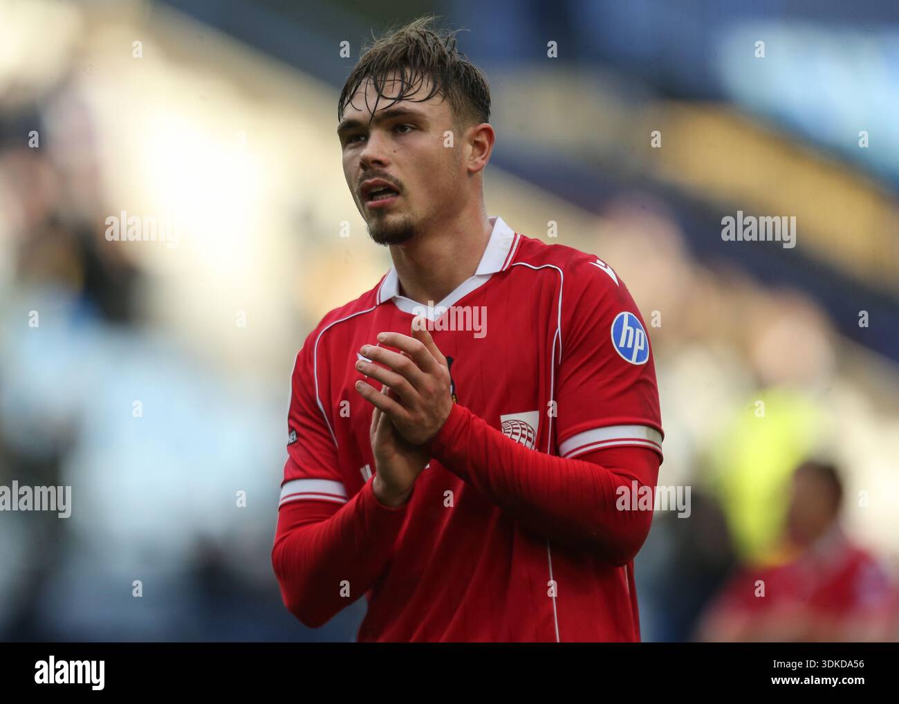 Callum Doyle of Wrexham applauds the fans after the final whistle ...