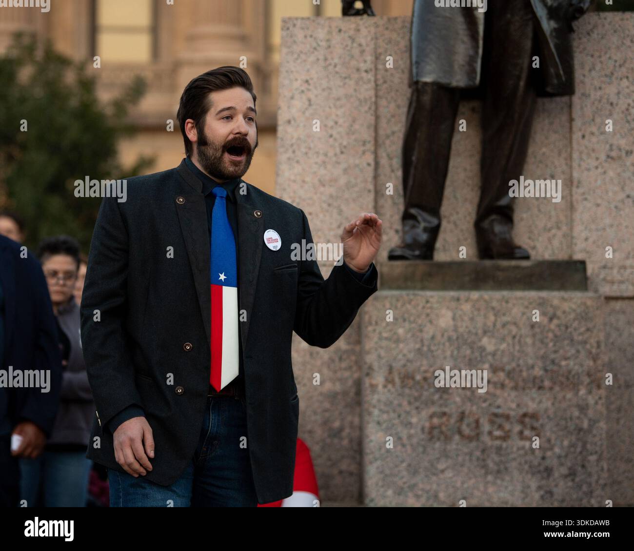 Student veteran Justin Walther speaks in Texas A&M's Academic Plaza ...