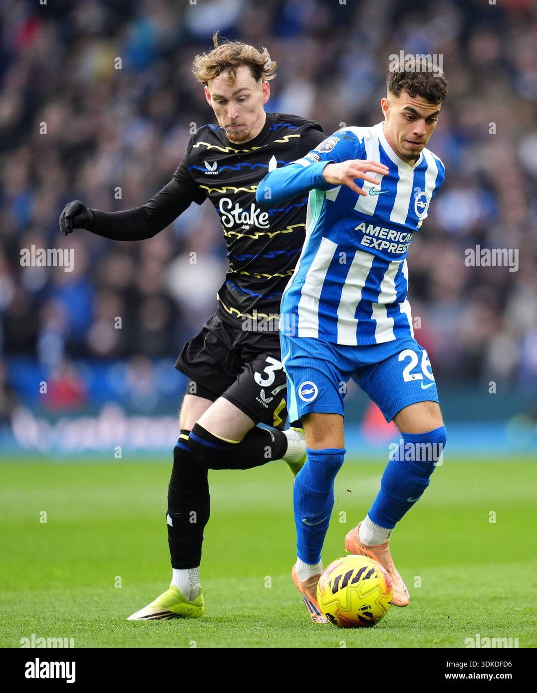 Everton's James Garner (left) and Brighton and Hove Albion's Yasin ...