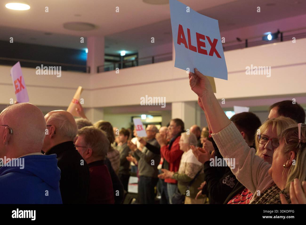 31 January 2026, Rhineland-Palatinate, Koblenz: Visitors hold a sign ...