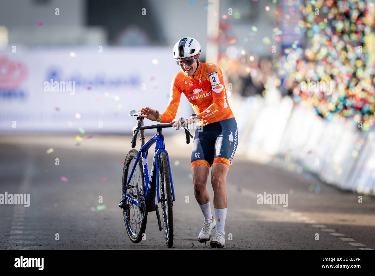 Dutch Lucinda Brand celebrates as she crosses the finish line to win ...