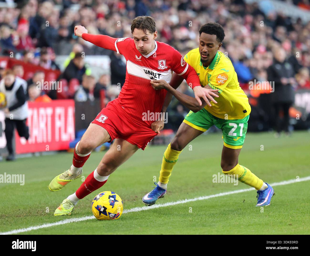 Middlesbrough's Callum Brittain (left) and Norwich City's Ali Ahmed ...