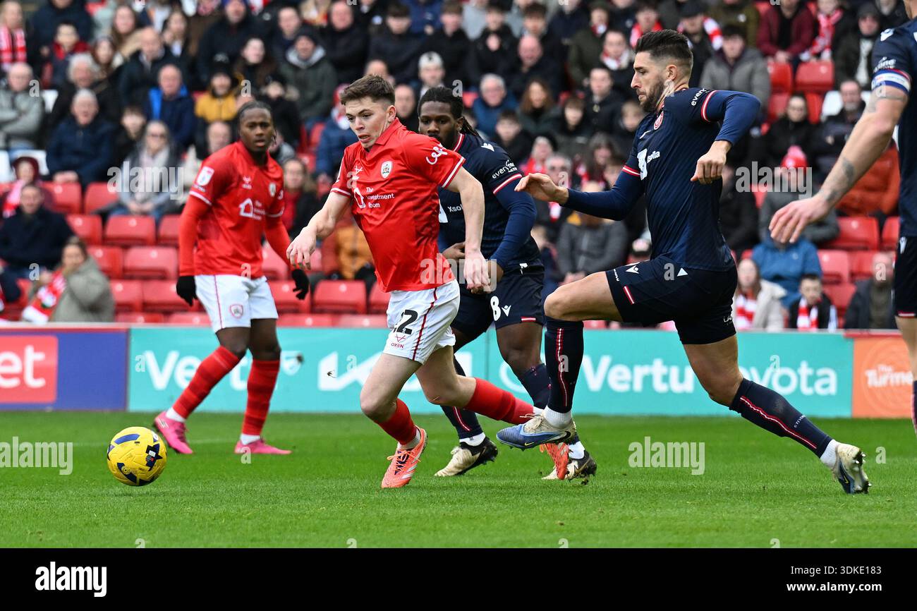 Barnsley's Patrick Kelly battles for the ball against Stevenage's Dan ...
