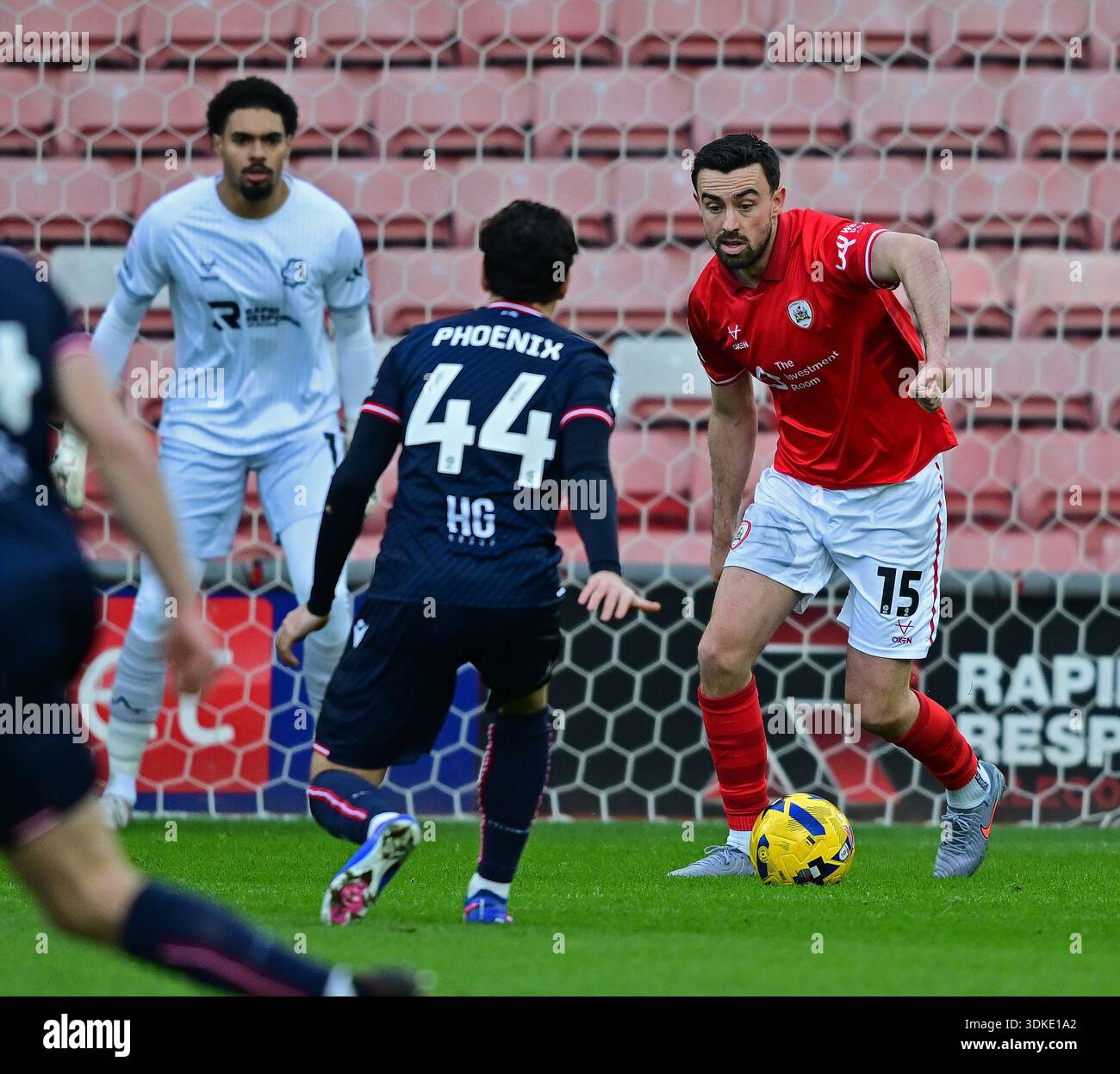 Barnsley's Eoghan O'Connell looks to play the ball forwardin the match ...
