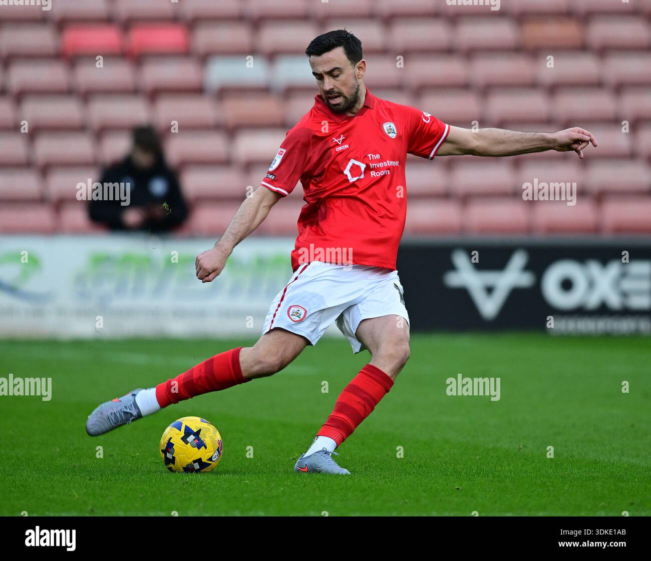 Barnsley's Eoghan O'Connell passes the ball in the match between ...
