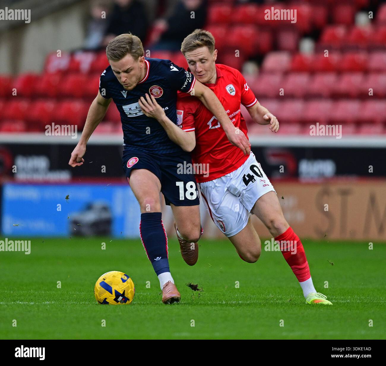 Barnsley's Davis Keillor-Dunn battles for the ball against Stevenage's ...