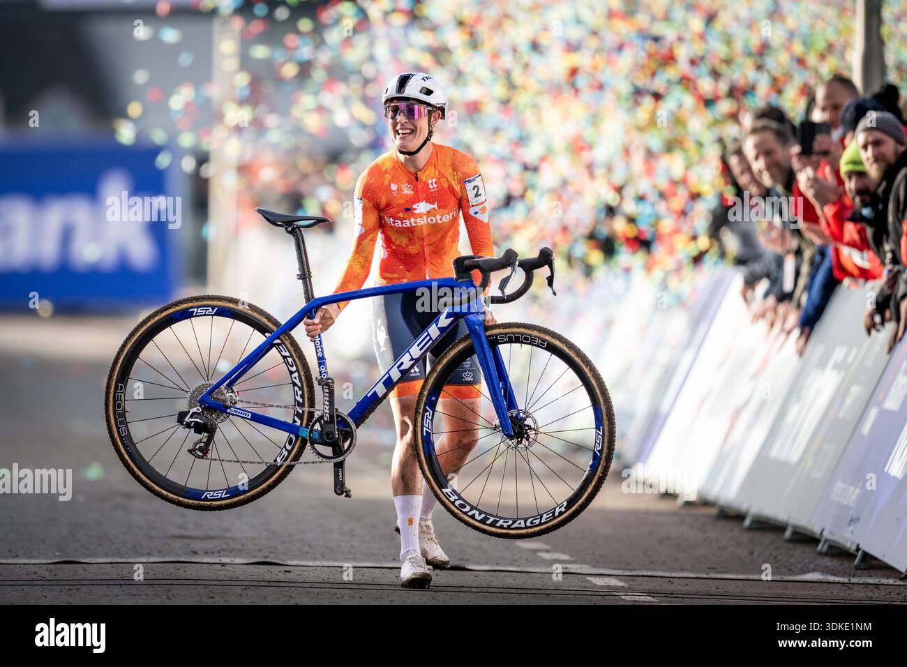 Dutch Lucinda Brand celebrates as she crosses the finish line to win ...