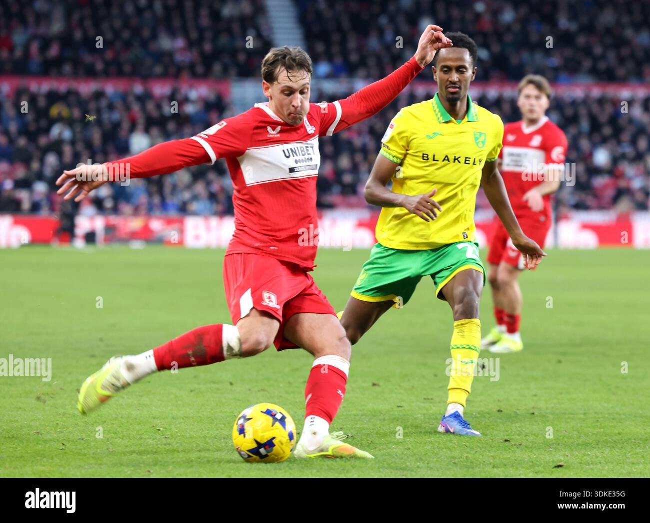 Middlesbrough's Callum Brittain (left) attempts a cross towards goal ...