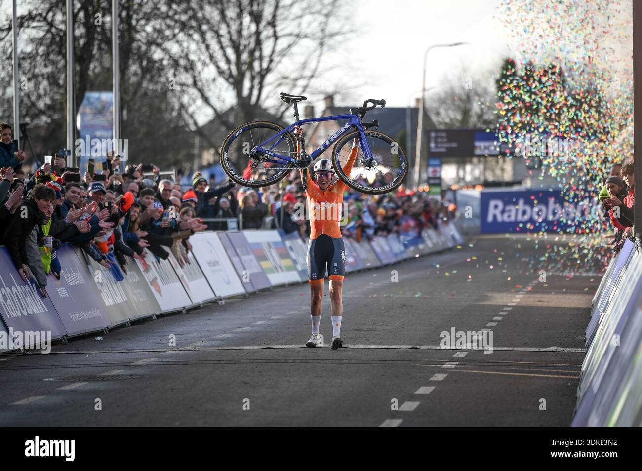 Dutch Lucinda Brand celebrates as she crosses the finish line carrying ...