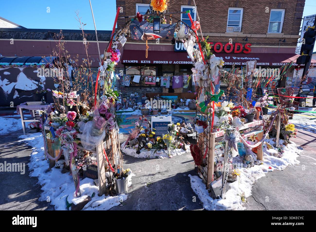 Flowers are placed at a memorial at George Floyd Square on Saturday ...
