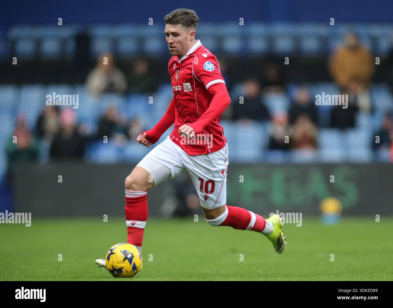 Josh Windass of Wrexham breaks with the ball during the Sky Bet ...
