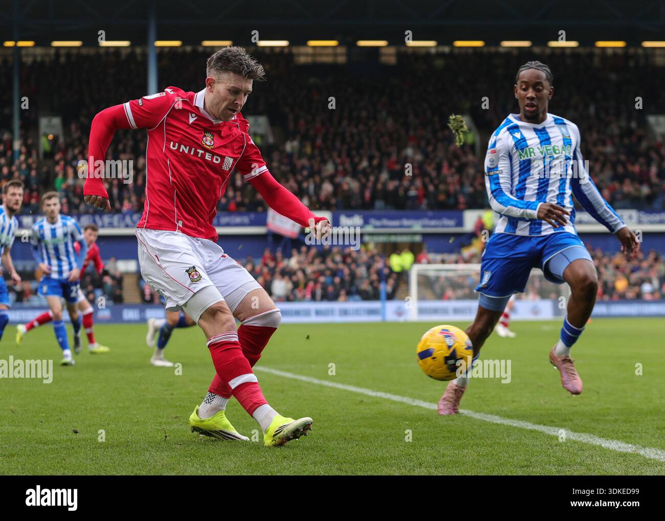 Josh Windass of Wrexham crosses the ball during the Sky Bet ...