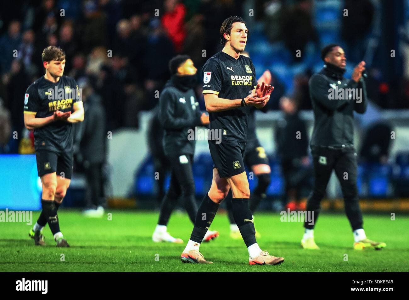 Alex Mitchell of Plymouth Argyle applauds the fans during the Stockport ...
