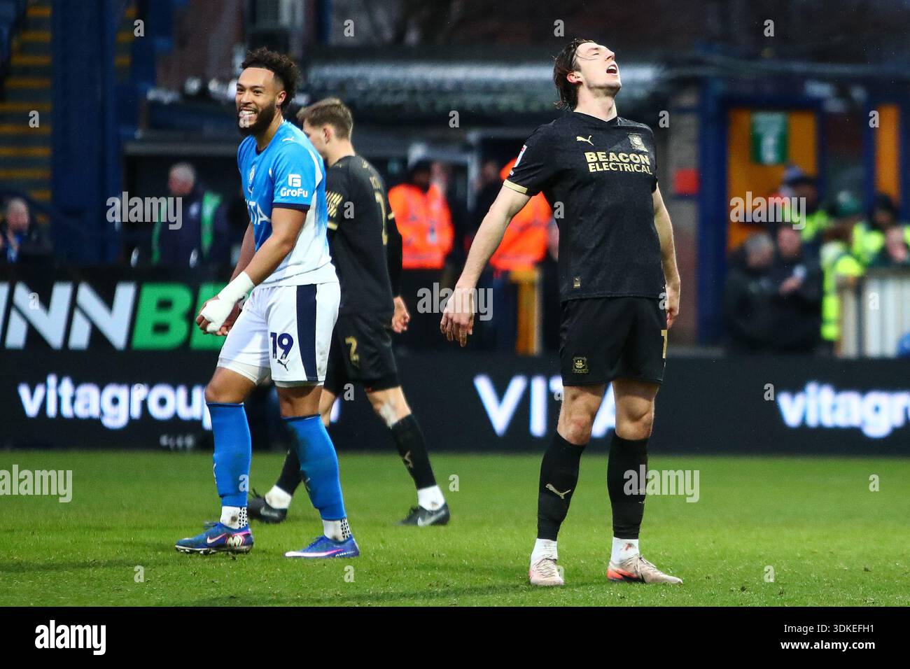 Alex Mitchell of Plymouth Argyle looks dejected during the Stockport ...