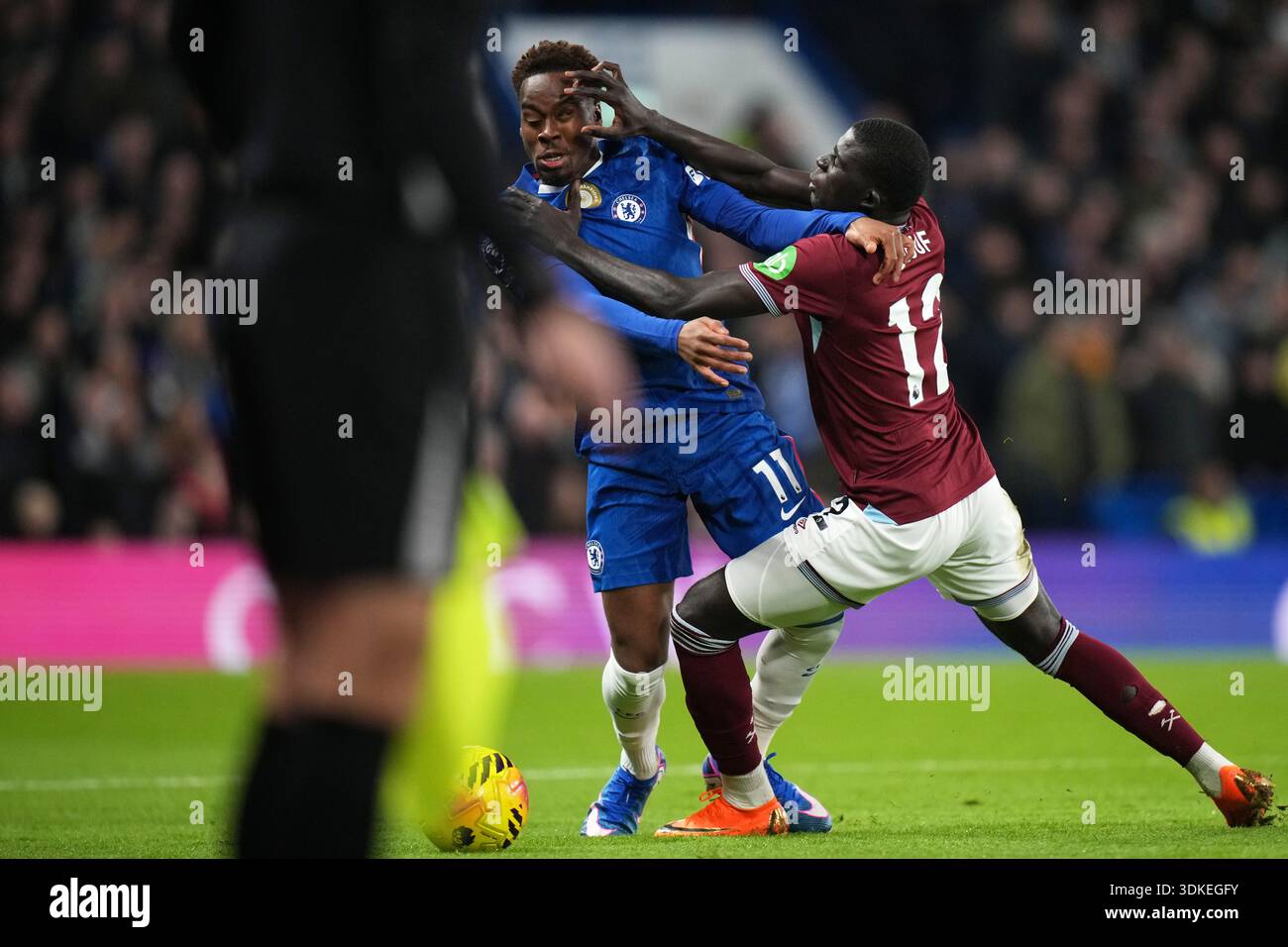 West Ham's El Hadji Malick Diouf, right, fights for the ball with ...