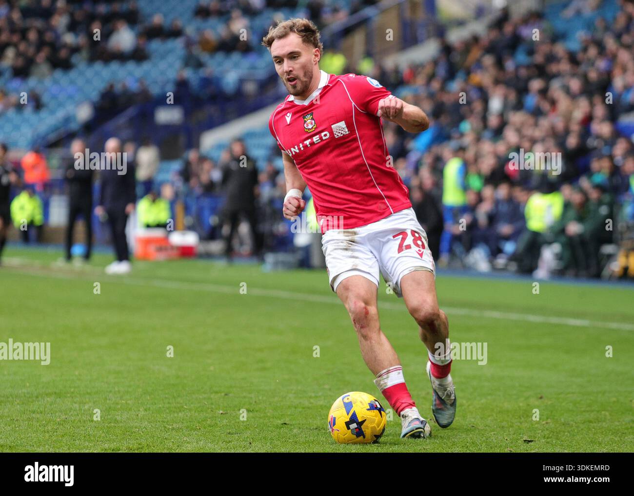 Sam Smith of Wrexham with the ball during the Sky Bet Championship ...