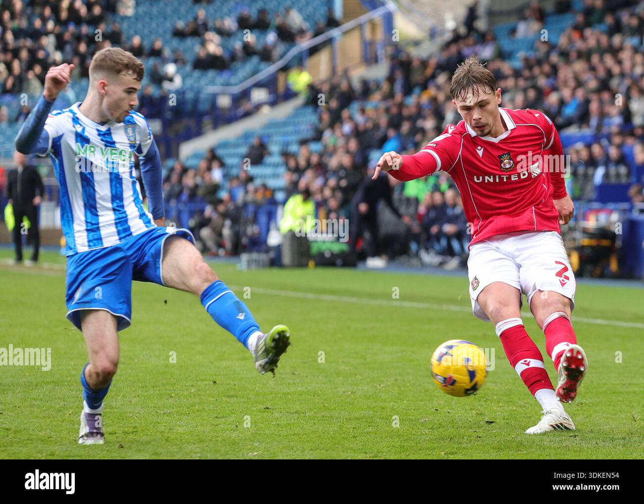 Callum Doyle of Wrexham crosses the ball during the Sky Bet ...