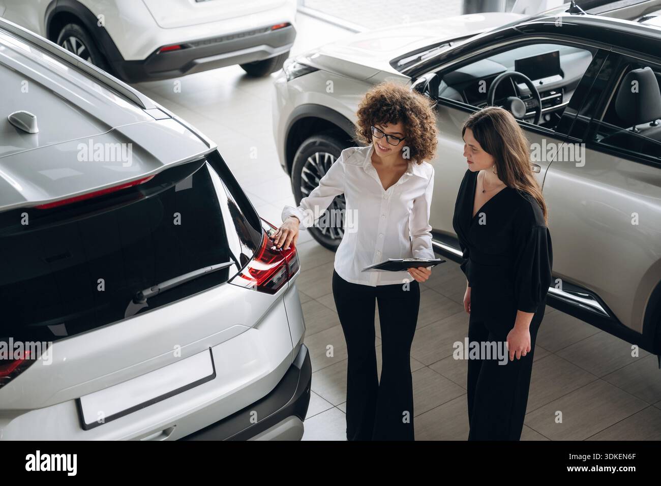 Retail young worker hi-res stock photography and images - Alamy