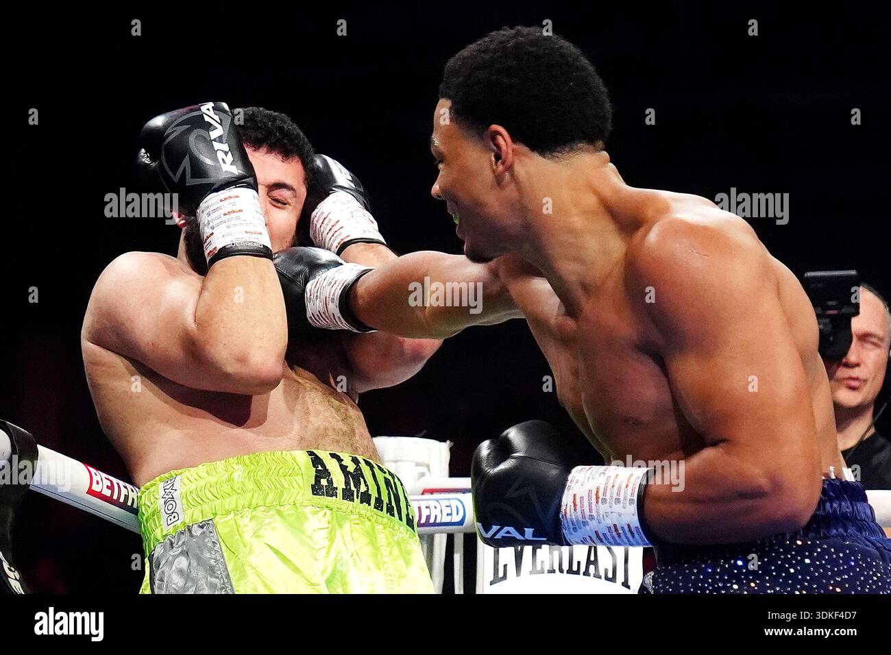 Leo Atang (right) and Amine Boucetta during their heavyweight bout at ...