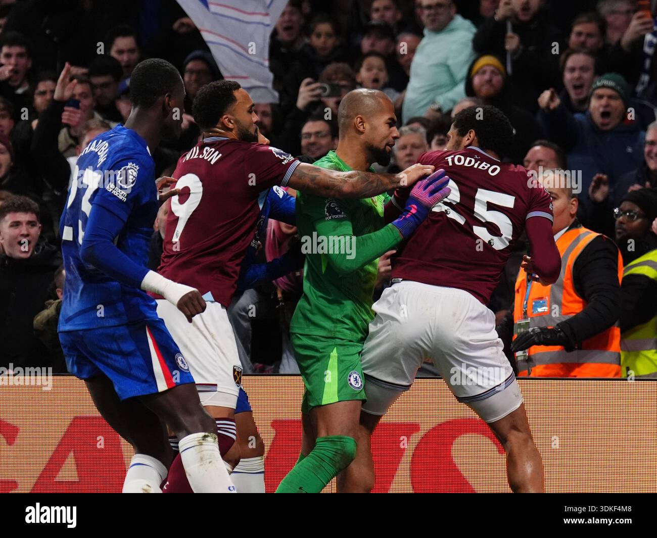 West Ham United's Jean-Clair Todibo is held back during the Premier ...