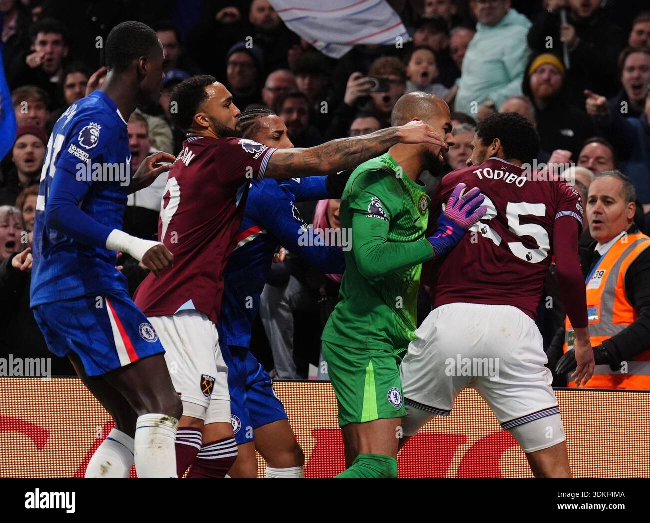 West Ham United's Jean-Clair Todibo is held back during the Premier ...