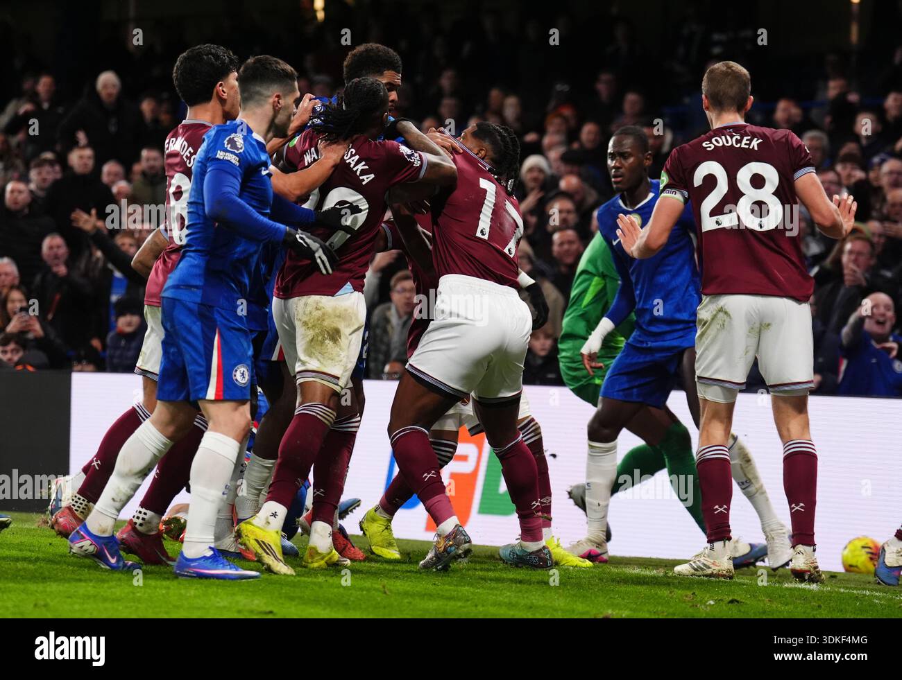 West Ham United's Adama Traore is held back during the Premier League ...