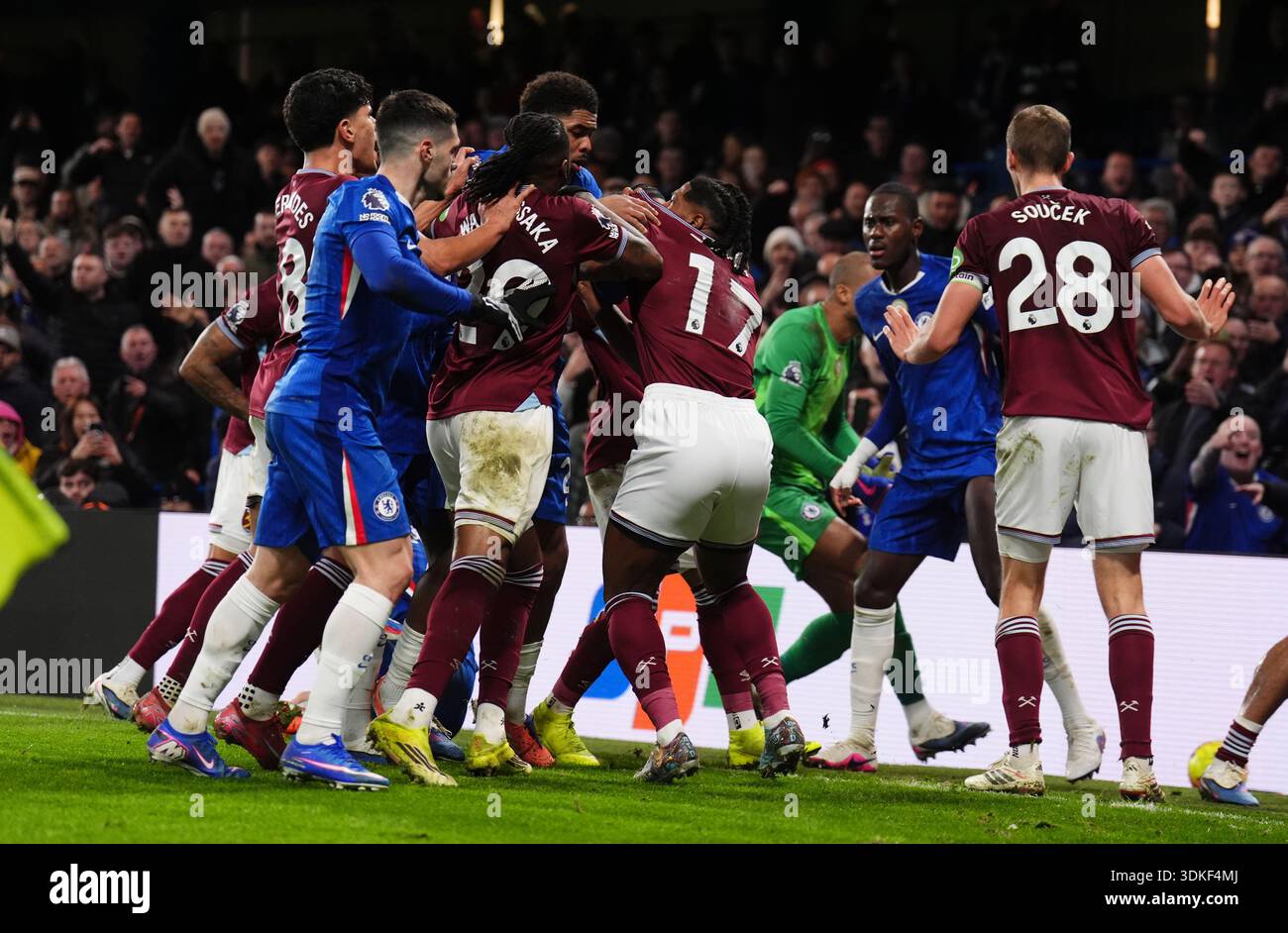 West Ham United's Adama Traore is held back during the Premier League ...