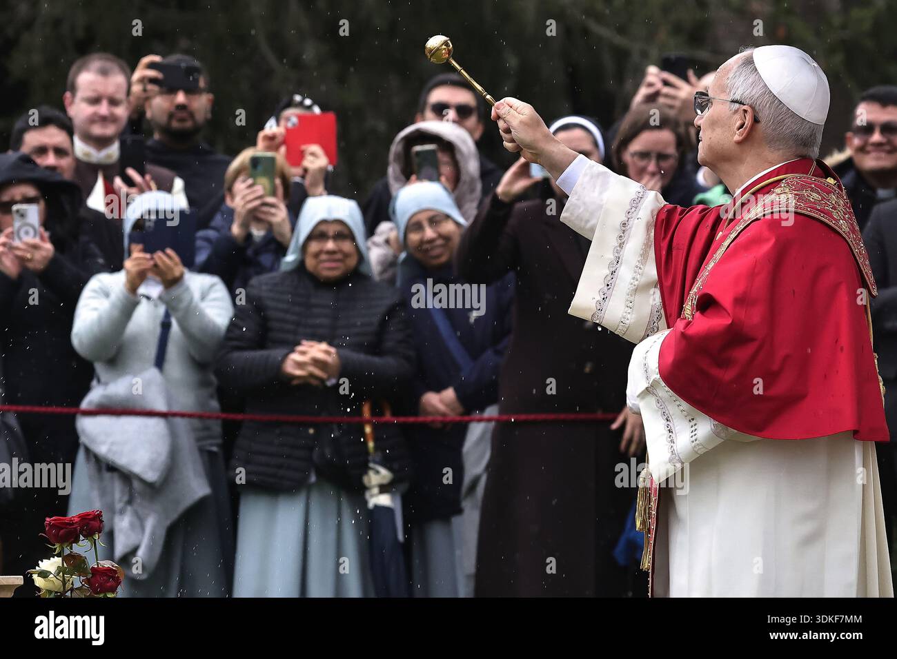 Pope Leo XIV gives his blessing during an inauguration ceremony of a ...