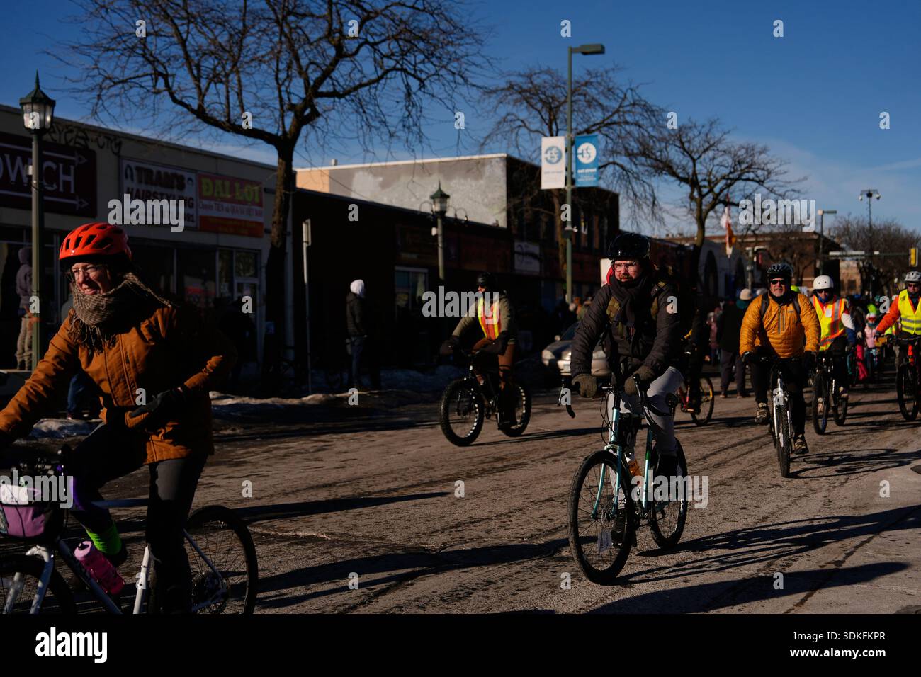People gather for a solidarity bike ride for Alex Pretti and Renee Good ...