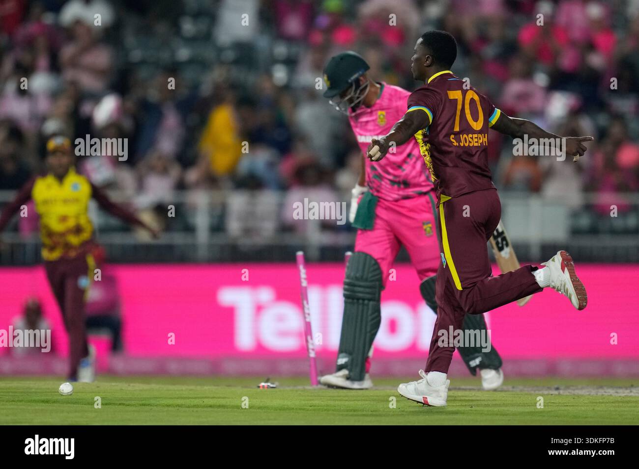 West Indies bowler Shamar Joseph, right, celebrates after bowling South ...