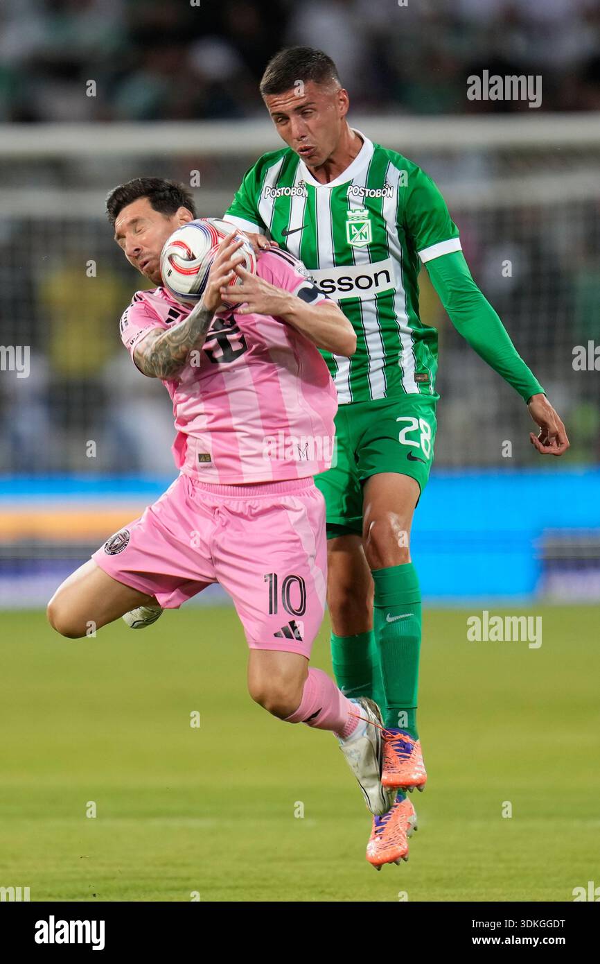 Inter Miami's Lionel Messi, left, and Simon Garcia of Colombia's ...