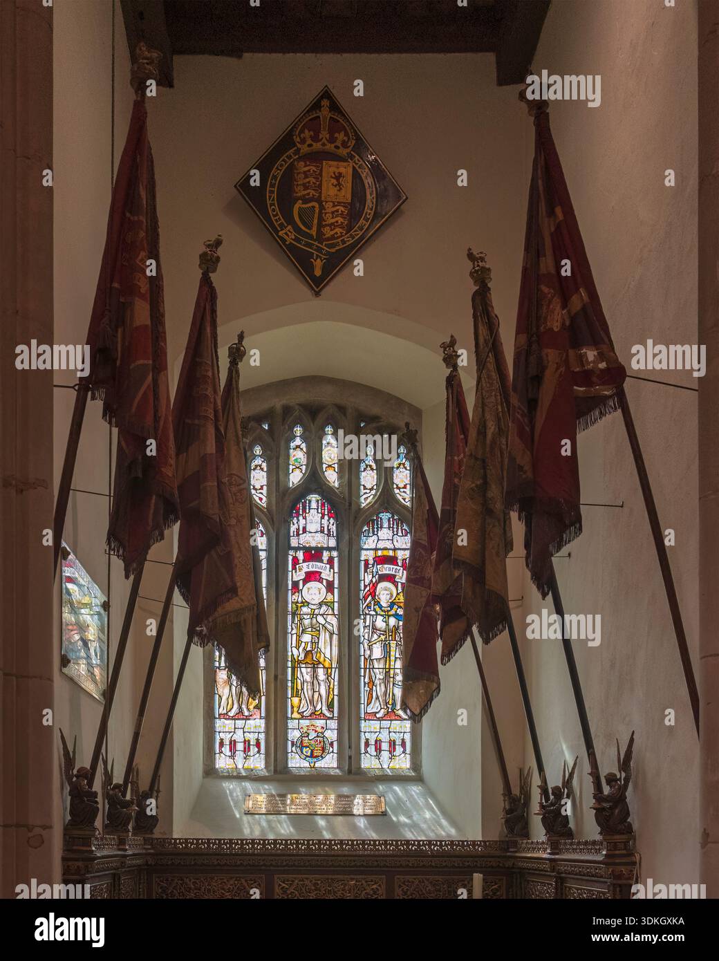 Stained glass window and Regimental Colours (Flags) at the west end of ...