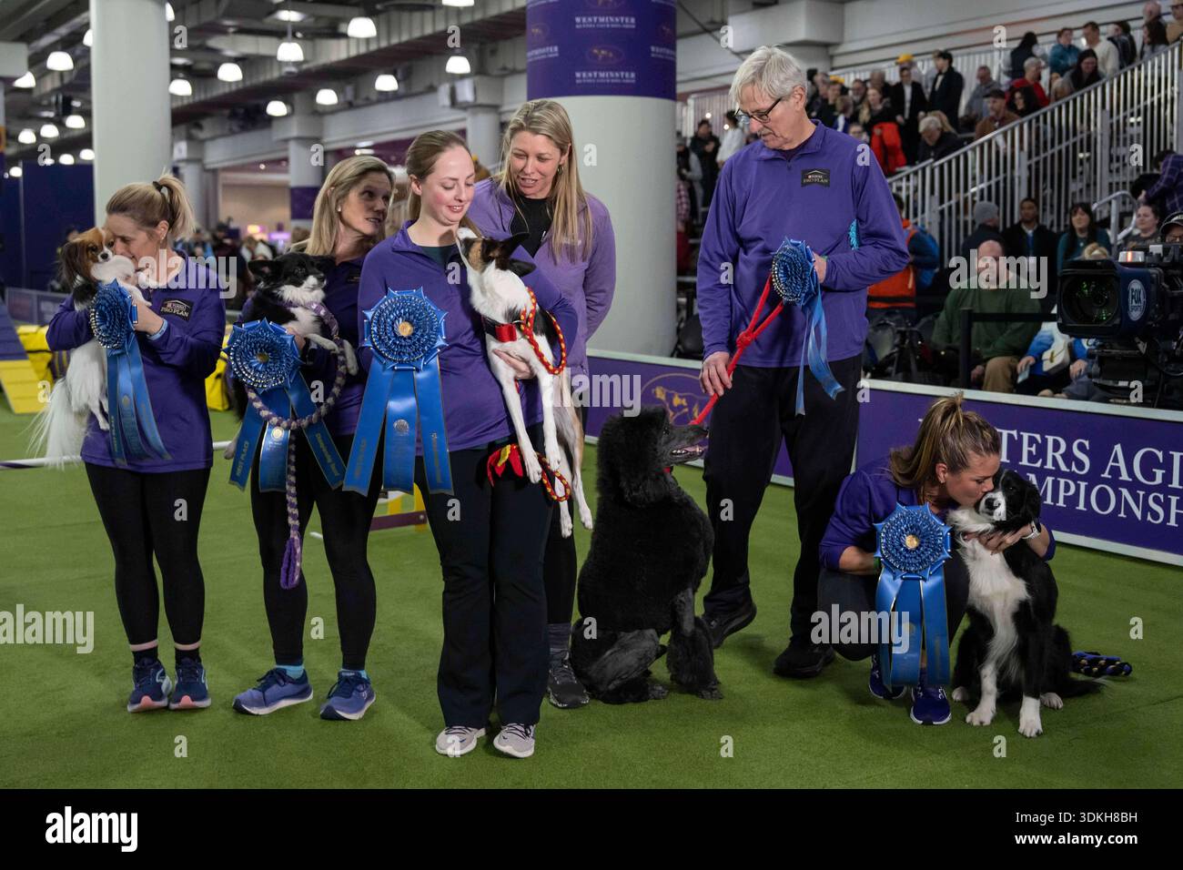 Winners of the Masters Agility Championship Finals pose for a picture ...