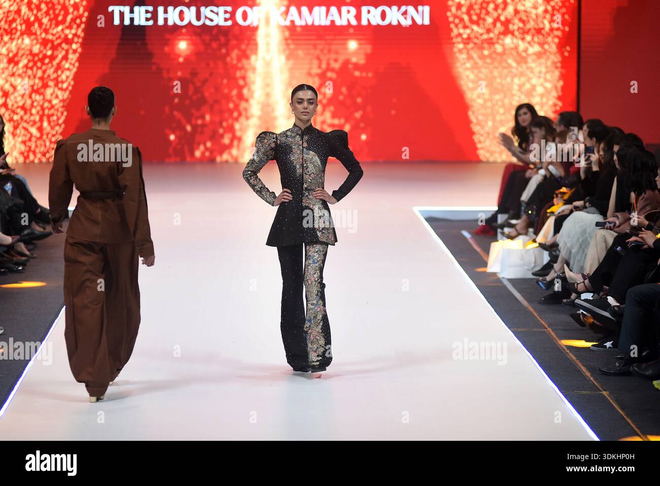 A model presents a creation by a Pakistani designer during LAAM Fashion ...