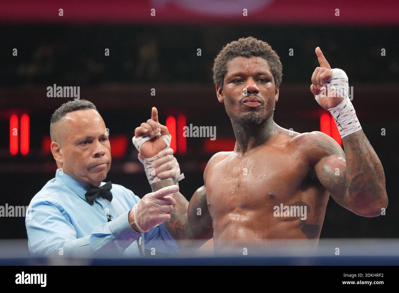 Austin Williams gestures after beating Wendy Toussaint during a light ...
