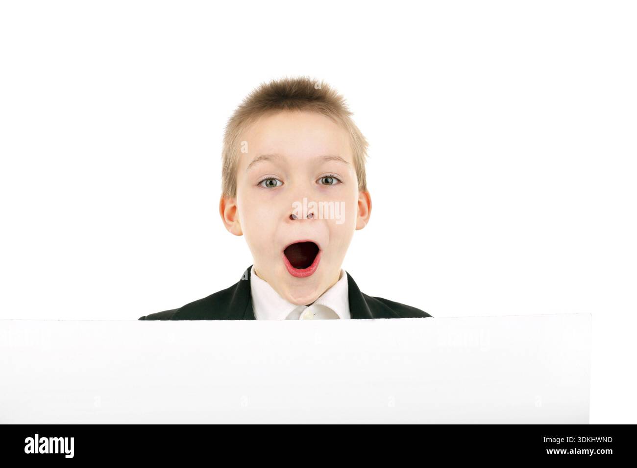 Amazed child behind blank hi-res stock photography and images - Alamy