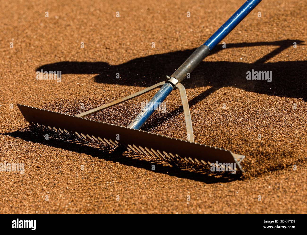 GUADALAJARA, MEXICO - JANUARY 31: Detail of a rake and the shadow of a ...